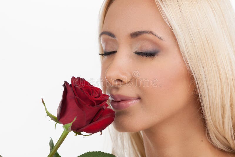 Oler una flor. imagen de archivo. Imagen de rosa, conceptos - 32613533