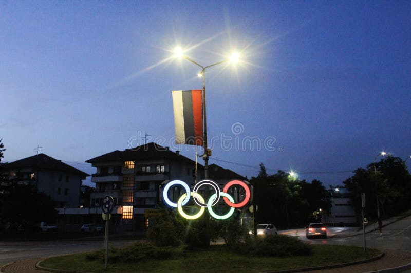 Olimpic Circles and Flag at Night Editorial Photography - Image of ...