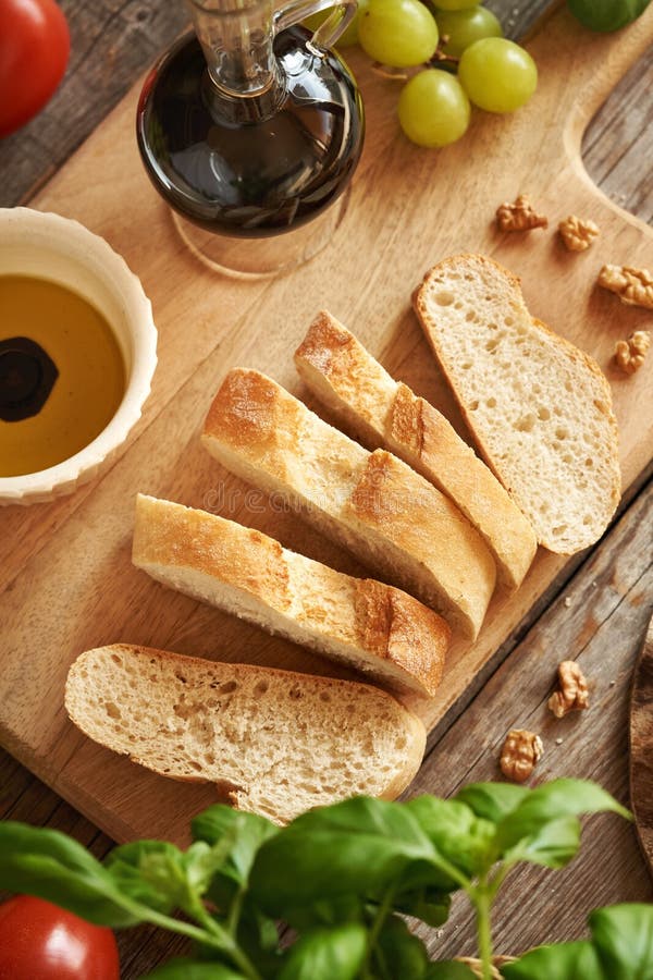 Olive Oil with Balsamic Vinegar, Ciabatta, Fresh Basil, Grapes and ...