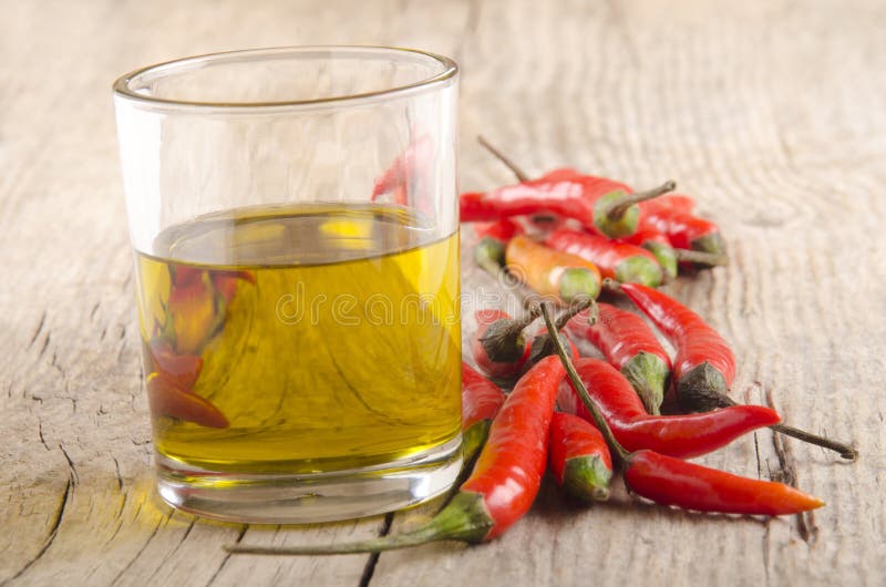 Olive oil and red chili stock image. Image of seasoning - 38836877