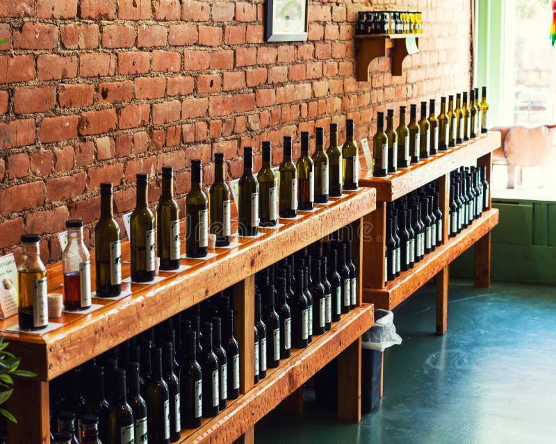 Olive oil shop editorial image. Image of bottles, board - 38376110