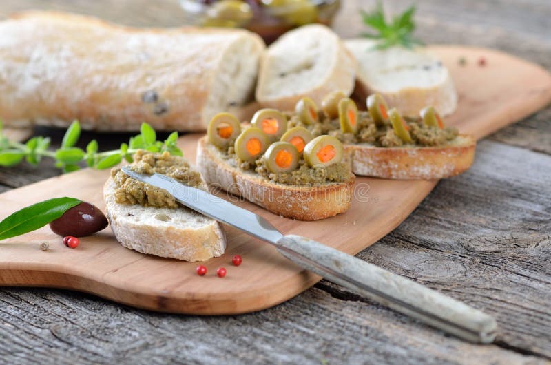 Olive snack stock image. Image of black, party, knife - 25454063