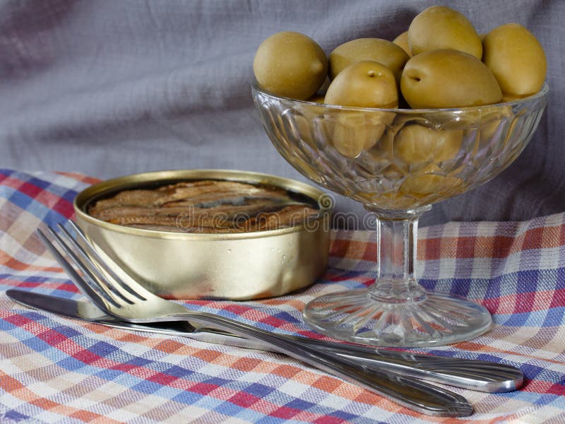 Olives and Canned Fish, Fork, Knife Stock Photo - Image of napkin ...