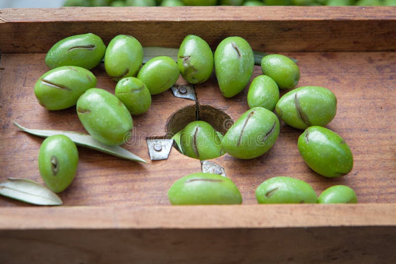 Olives preparing stock image. Image of healthy, clothing - 137523049