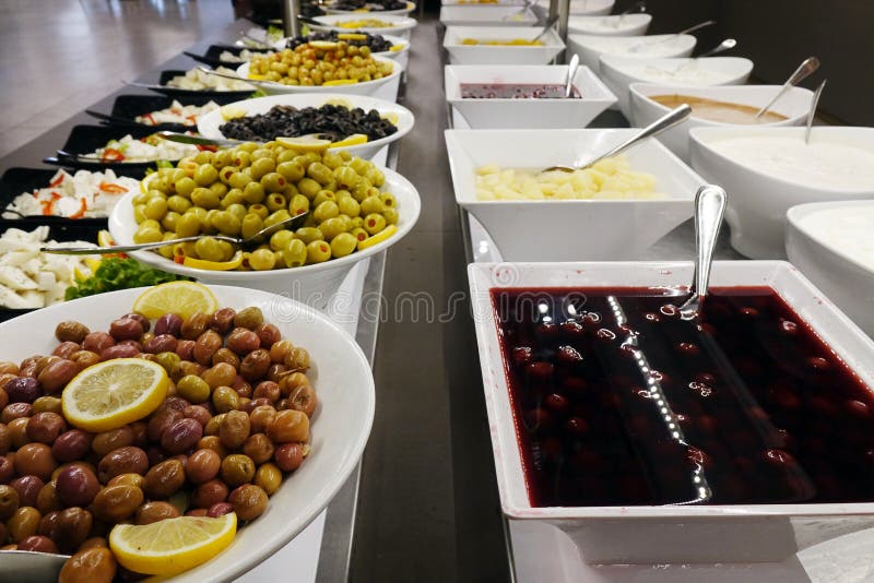 Olives and Sauces on the Buffet. Stock Photo - Image of container ...
