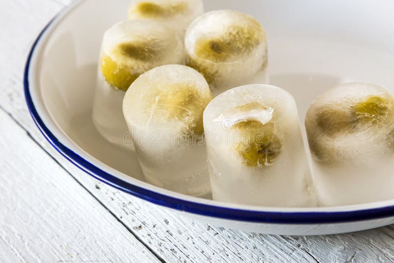 Olives Stuffed Inside an Ice Cube Stock Image - Image of greeting, meat ...