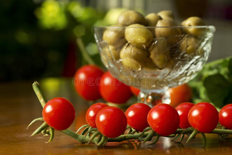 Olives and Tomatoes stock photo. Image of table, selective - 51111926