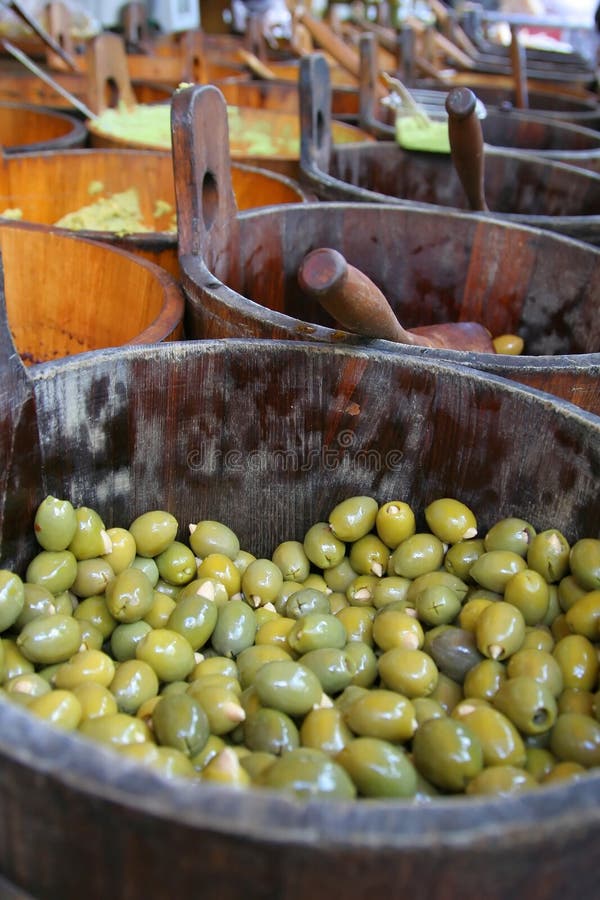 Olives in a wooden barrel stock photo. Image of market - 8920546
