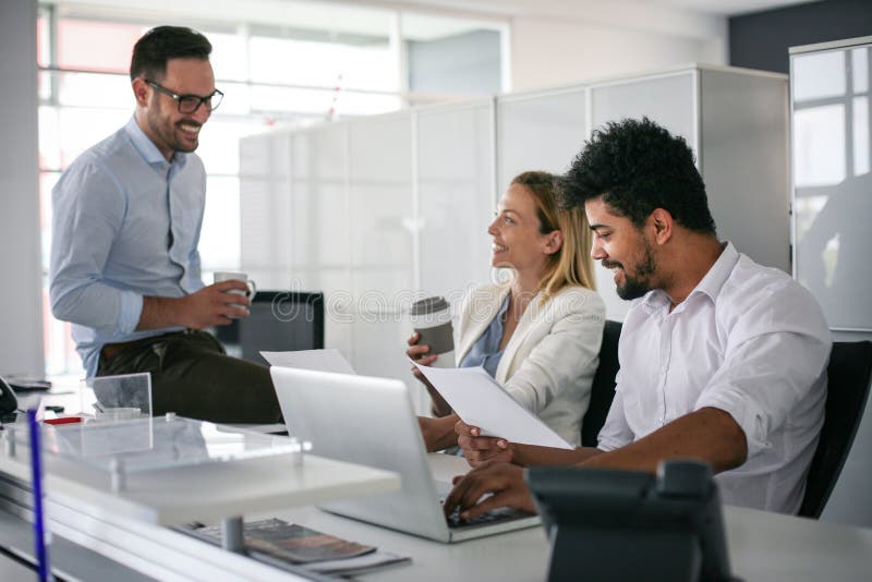 . Olleague in Office Using Computer and Checking Document. Stock Photo ...