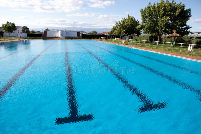 Olympic Pool with a Blue Water Stock Image - Image of luxury, lifestyle ...