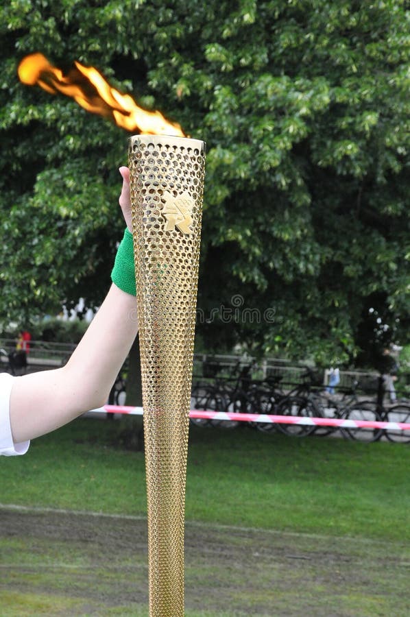 Olympic Torch editorial photography. Image of torchbearer - 25607287