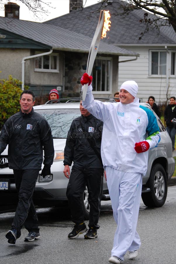 Olympic Torch Bearer editorial photography. Image of canada - 13297622
