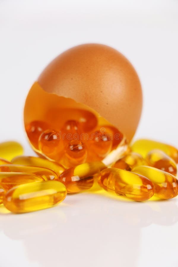 Omega Capsules in Brown Broken Egg. Stock Photo - Image of background ...