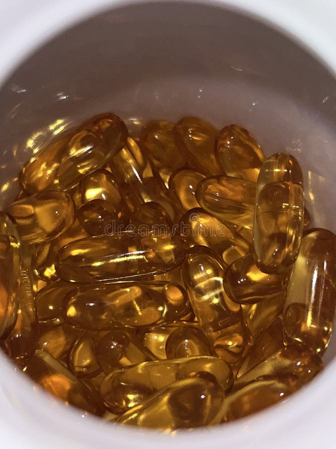Omega 3 capsules stock photo. Image of lifestyle, amber - 262474352