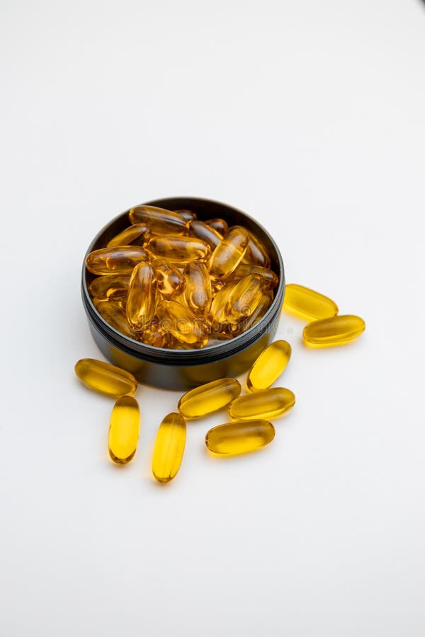 Omega 3 capsules in a jar stock image. Image of isolated - 203760925