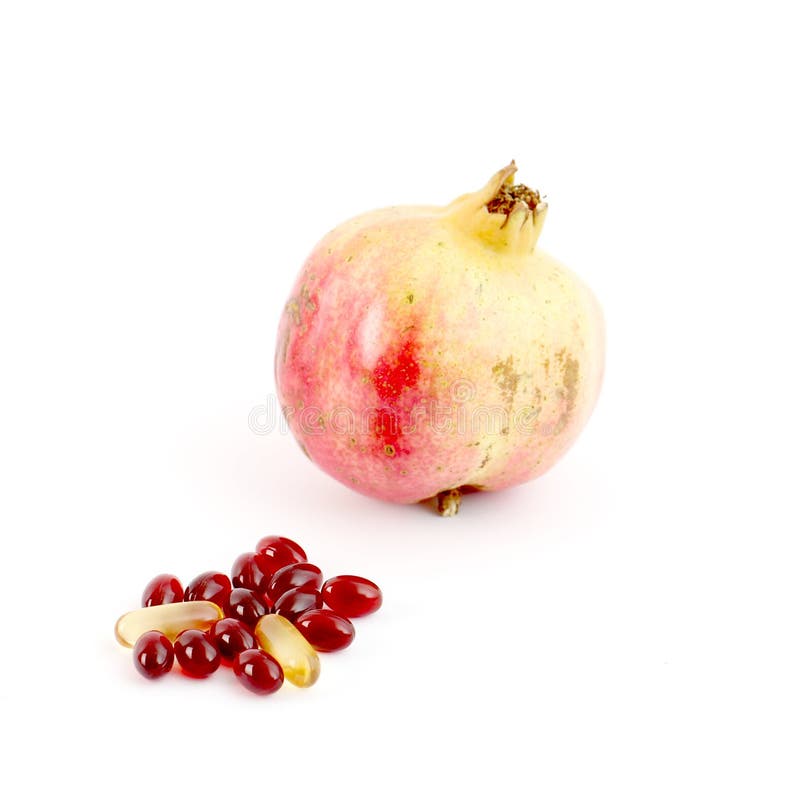 Omega 3 Capsules and Pomegranate Fruit on the White Background. Stock ...