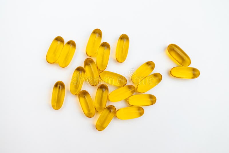 Omega 3 capsules on white stock image. Image of healthy - 203760931