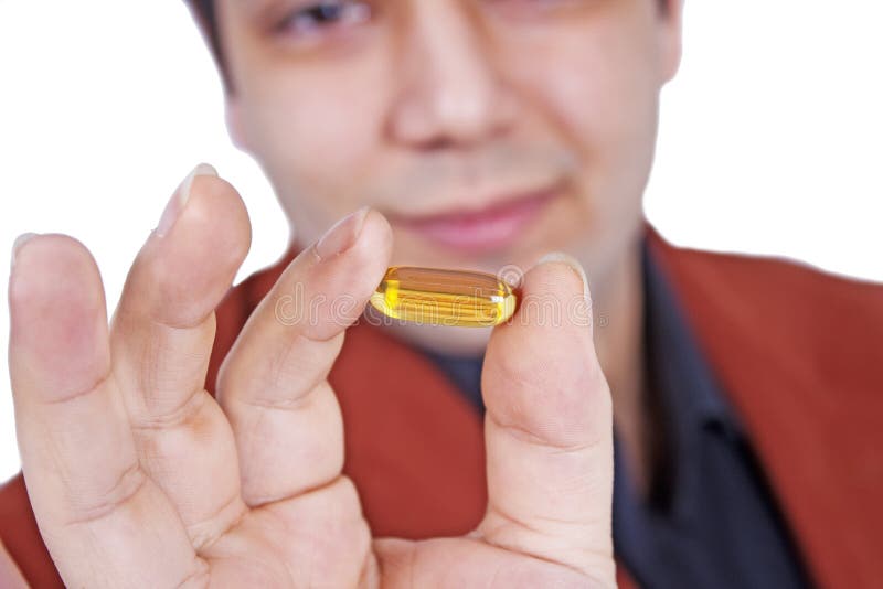 Omega pill holding hand stock image. Image of diary, omega - 13645397