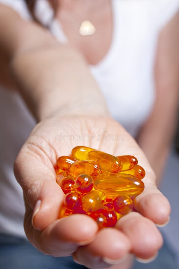 Omega pills stock photo. Image of hand, power, pill, diet - 13519474