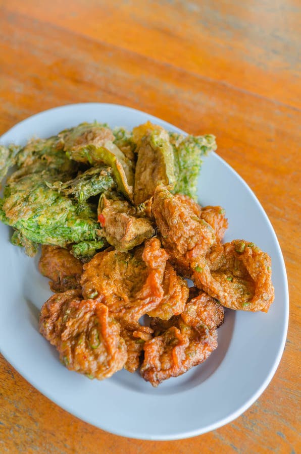 Omelet with Climbing Wattle and Fried Fish Cakes Stock Image - Image of ...