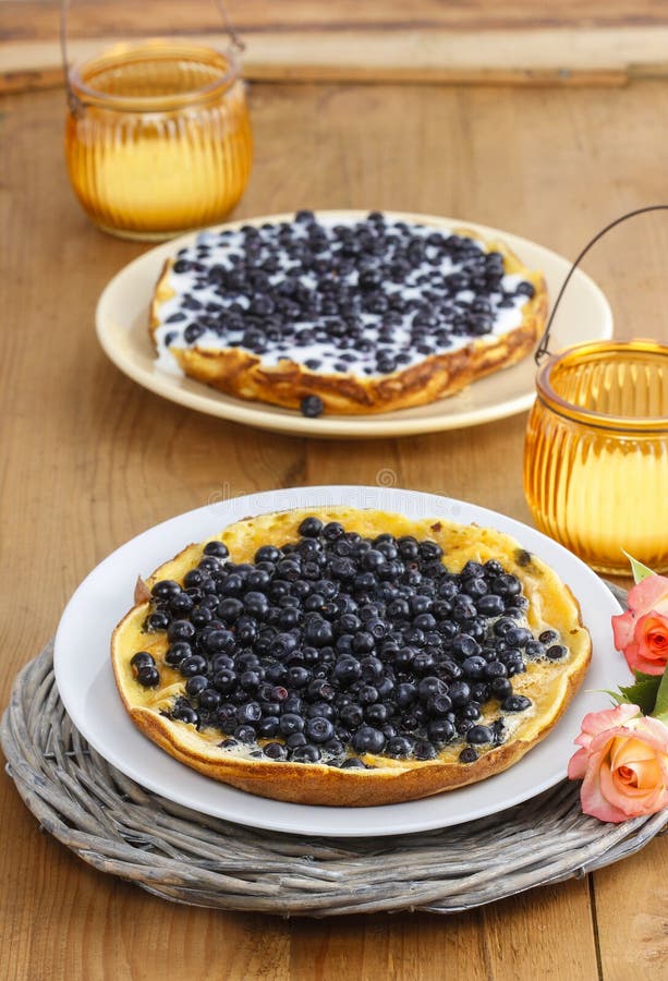 Omelette with Blueberries on Wooden Table Stock Photo - Image of ...