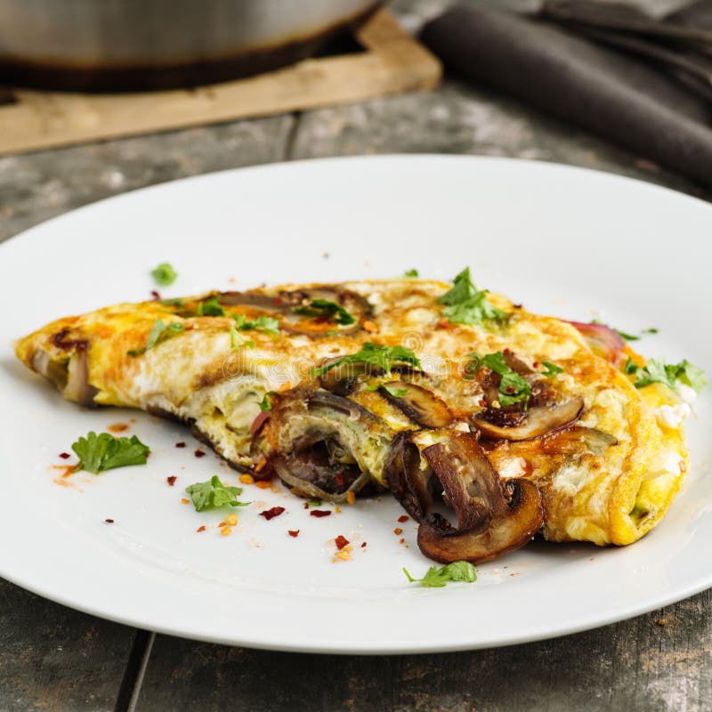Omelette con i funghi fotografia stock. Immagine di fresco - 115266900 Omelette con i funghi fotografia stock. Immagine di fresco - 115266900