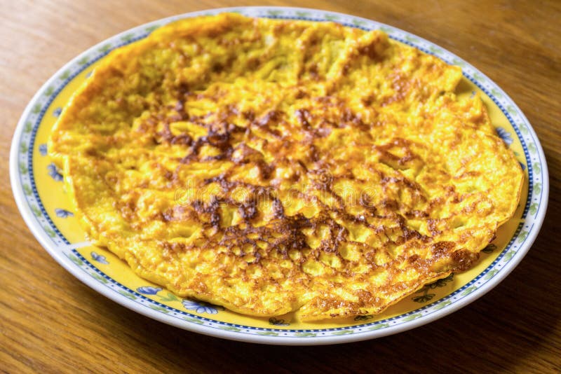 Omelette in a Plate on Wooden Table Stock Photo - Image of dinner ...