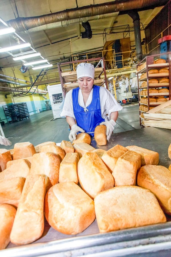 Omsk, Russia - December 19, 2014: Workers at Bread Factory Editorial ...