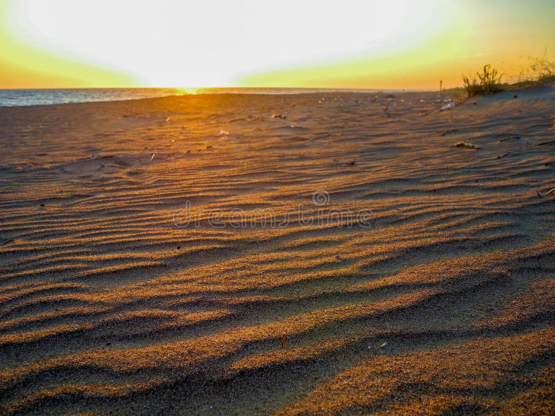 Onaangeroerd Zand Op Het Strand Stock Afbeelding - Image of griekenland ...