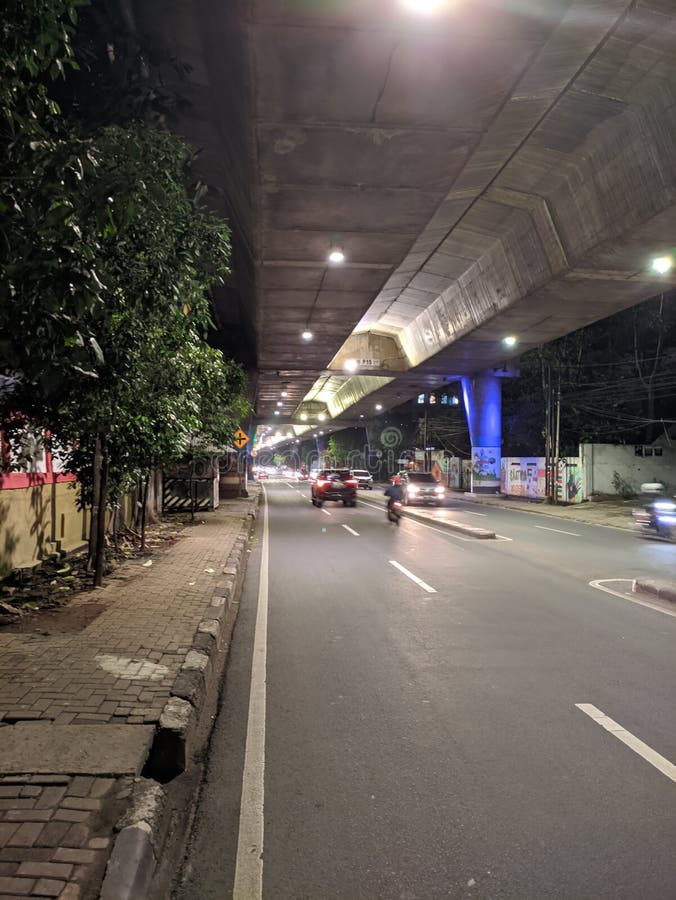 Flyover and the road below editorial photography. Image of vehicle ...