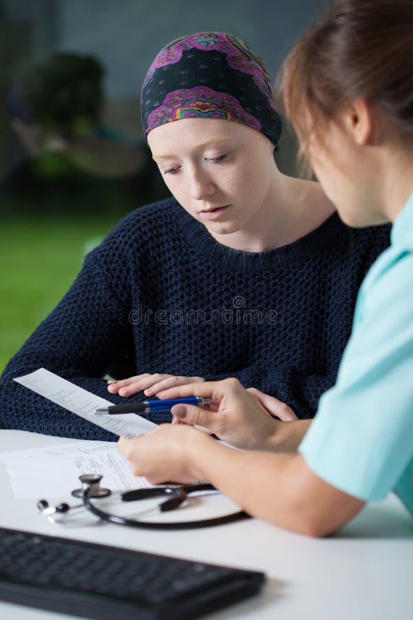 Oncologist Talking with Young Woman Stock Photo - Image of medicine ...