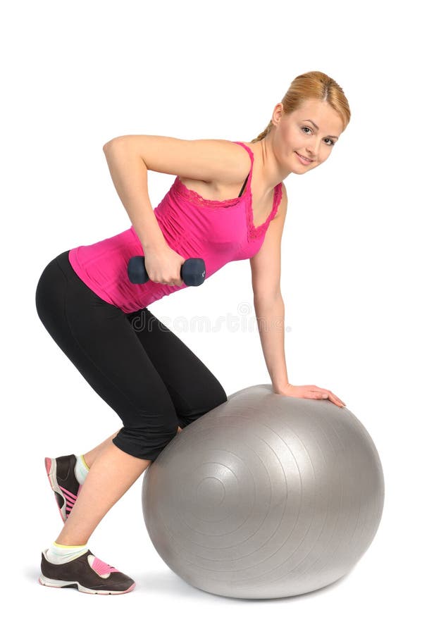 One-Arm Dumbbell Row on Stability Fitness Ball Exercise Stock Photo ...