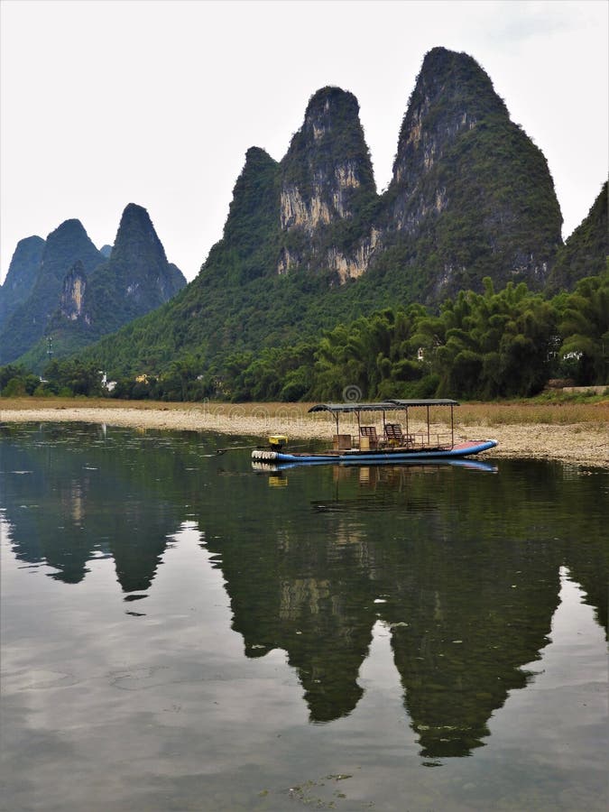 Bamboo Raft at Base of Mountains in Guilin China Stock Photo - Image of ...