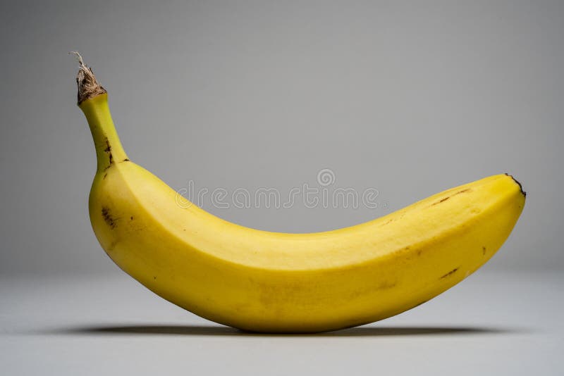 One Banana Shot on a Grey Studio Background Stock Image - Image of ...