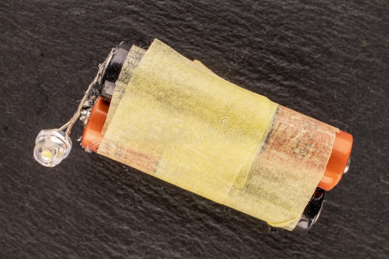 One Battery-powered Flashlight with LEDs Isolated on a White Background ...