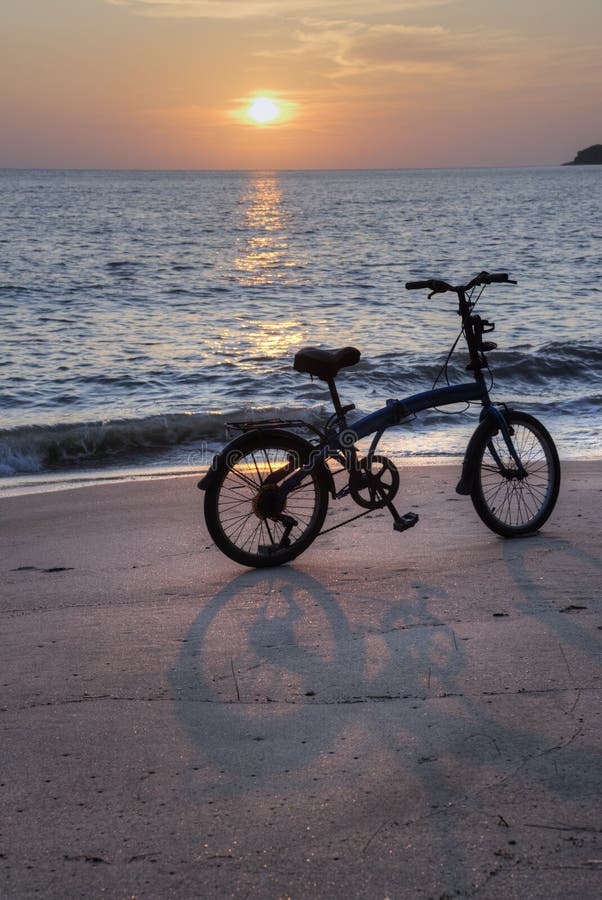 One Bicycle Stranded at the Sandy Beach. Stock Photo - Image of ...