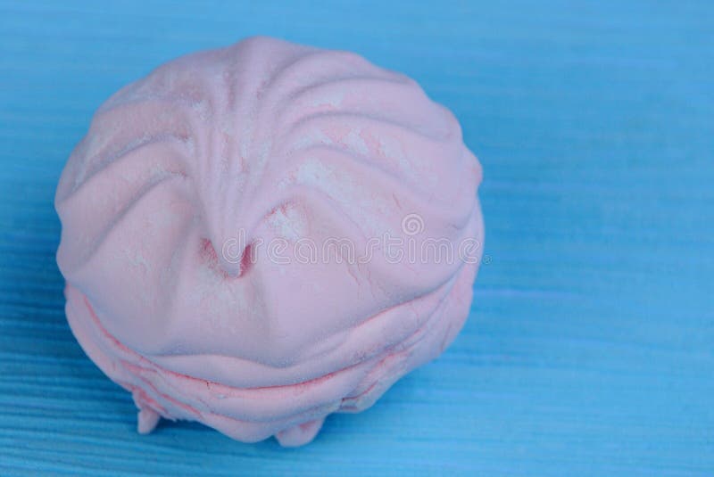One Big Pink Marshmallow is on a Blue Table Stock Image - Image of ...