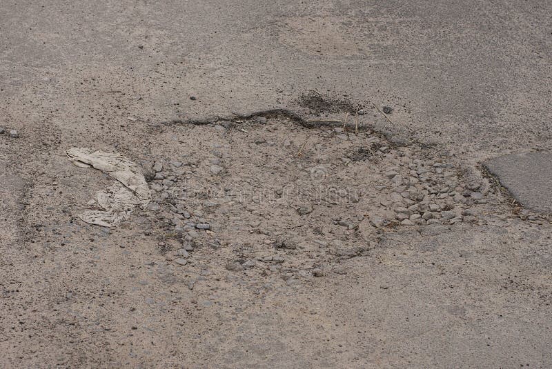 One Big Pothole on the Gray Asphalt Road Stock Photo - Image of ...