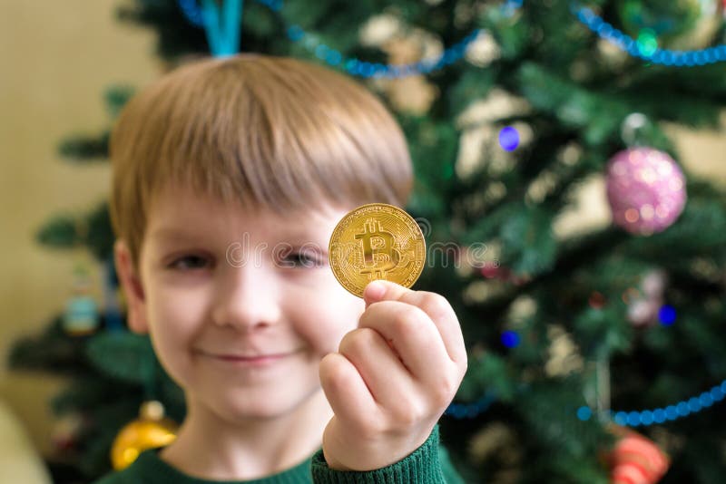 One Bitcoin in the Hand of Young Boy. Concept Stock Image - Image of ...