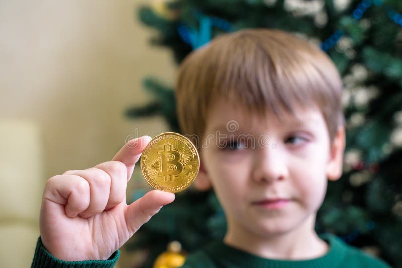 One Bitcoin in the Hand of Young Boy. Concept Stock Photo - Image of ...