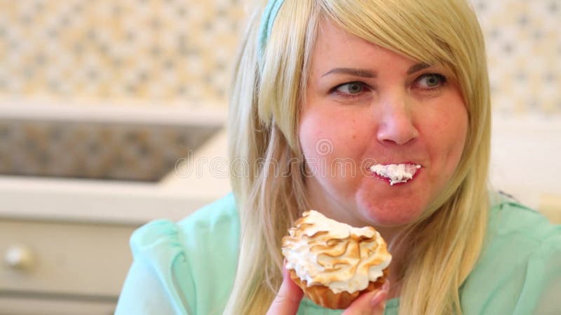 The One Blond Woman Eating a Delicious Cake with Stock Footage - Video ...