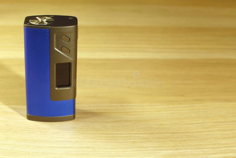 One Blue Boxmod Device for Vaping Electronic Cigarette on the Wooden ...