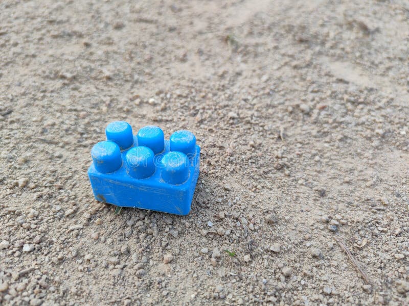 One Blue Lego on Sandy Ground Stock Image - Image of blue, ground ...