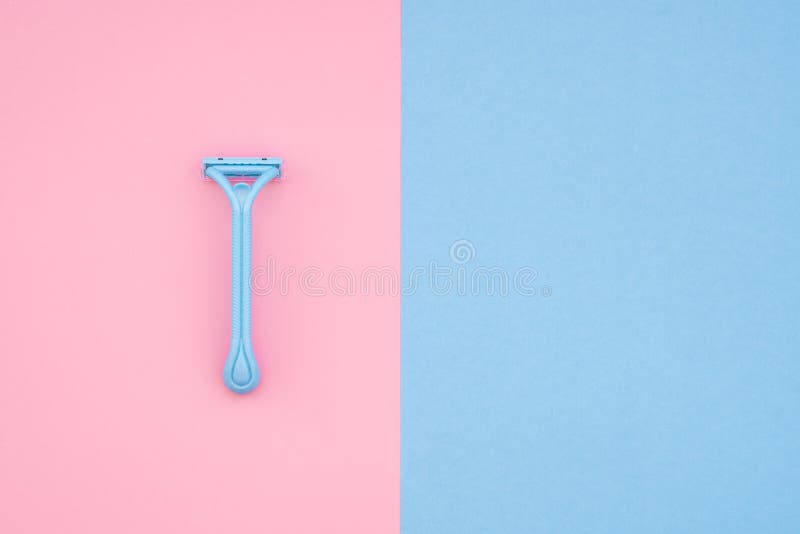 One Blue Razor Isolated on a Pink Background, Blue Background for ...