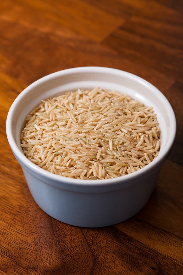 One bowl of uncooked rice stock image. Image of food - 35685883