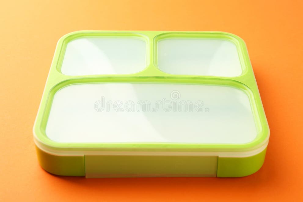 One Bright Lunch Box on Orange Background Stock Image - Image of ...