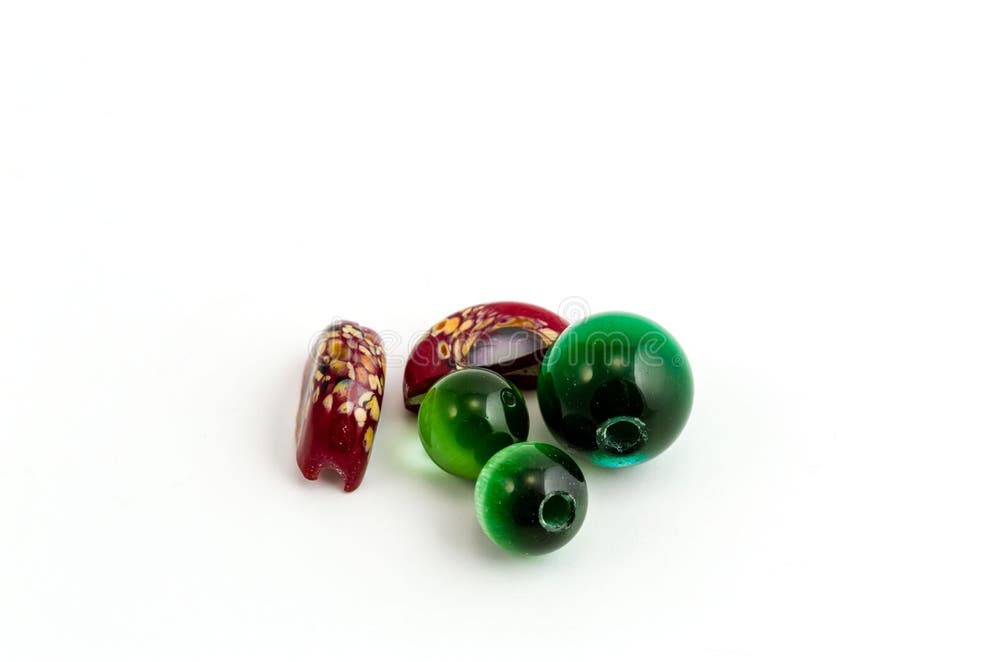 One Broken Red Bead and Three Misplaced Green Beads Stock Image - Image ...