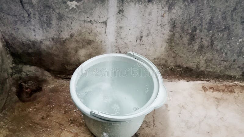 One Bucket of Water, with Dirty Walls, Background. Stock Image - Image ...