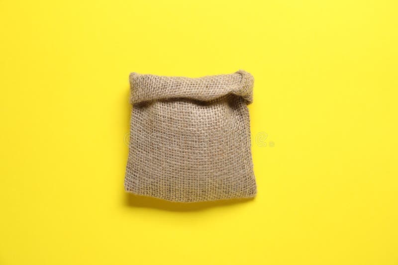 One Burlap Sack on Yellow Background, Top View Stock Image - Image of ...