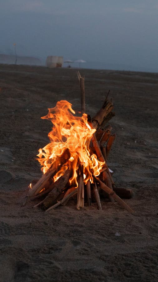 Burning Bonfire in the Sand of a Beach Stock Image - Image of beach ...